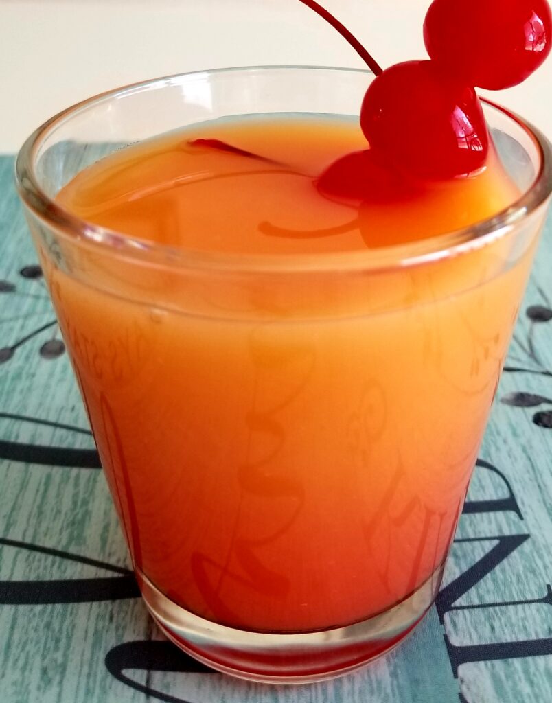 Sunset in a Glass: Orange Pineapple Rum Rise Cocktail - Café Flavorful